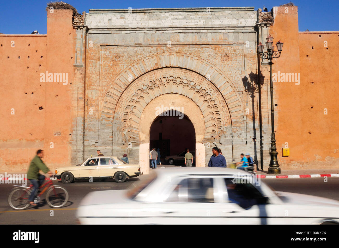 Bab Agnaou stone gate with traffic passing, near Kasbah in Marrakech ...