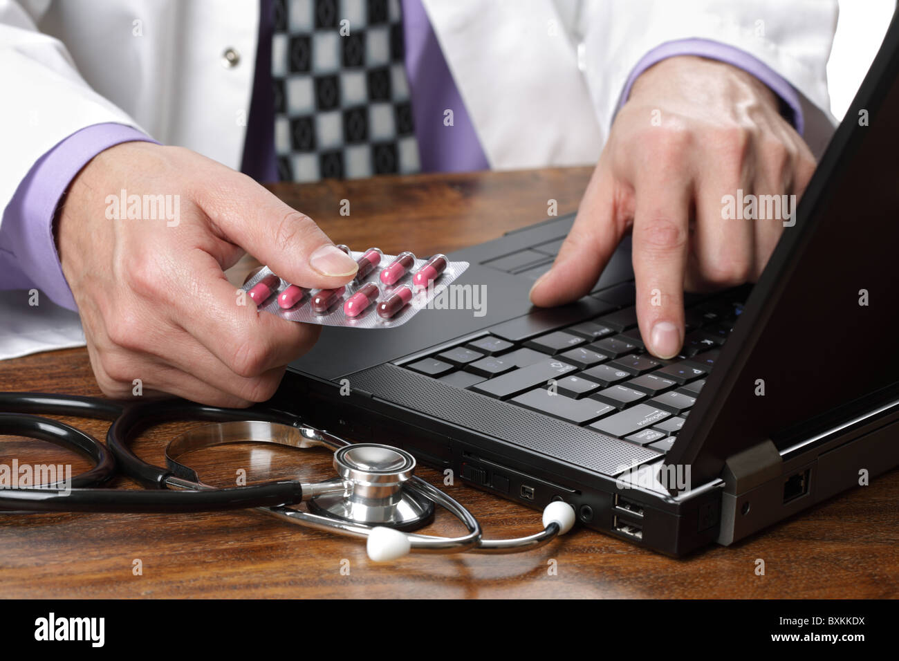 Doctor using computer Stock Photo - Alamy