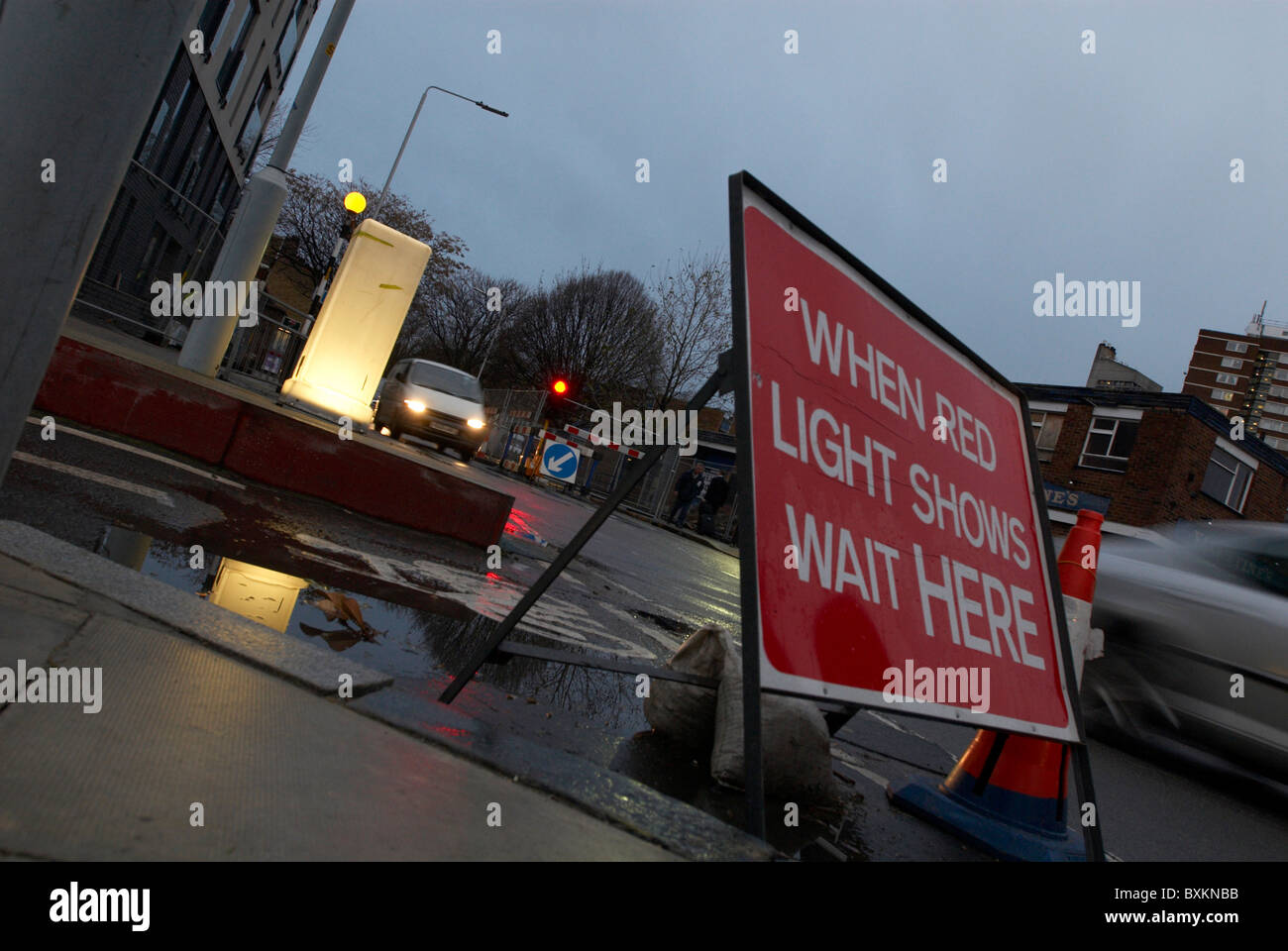 Roadworks traffic lights sign London UK Stock Photo - Alamy
