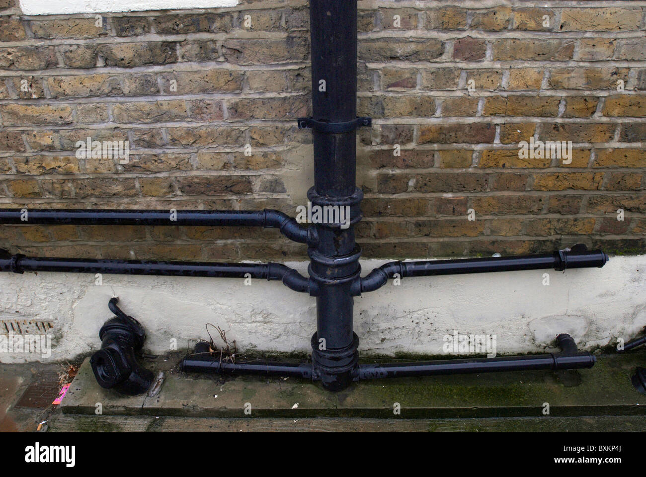 Cast Iron drainpipes and guttering on a Victorian building London UK ...