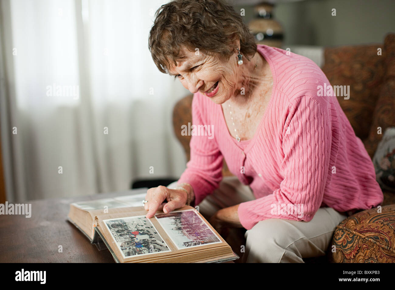 Senior woman of 74 years old at home hi-res stock photography and ...