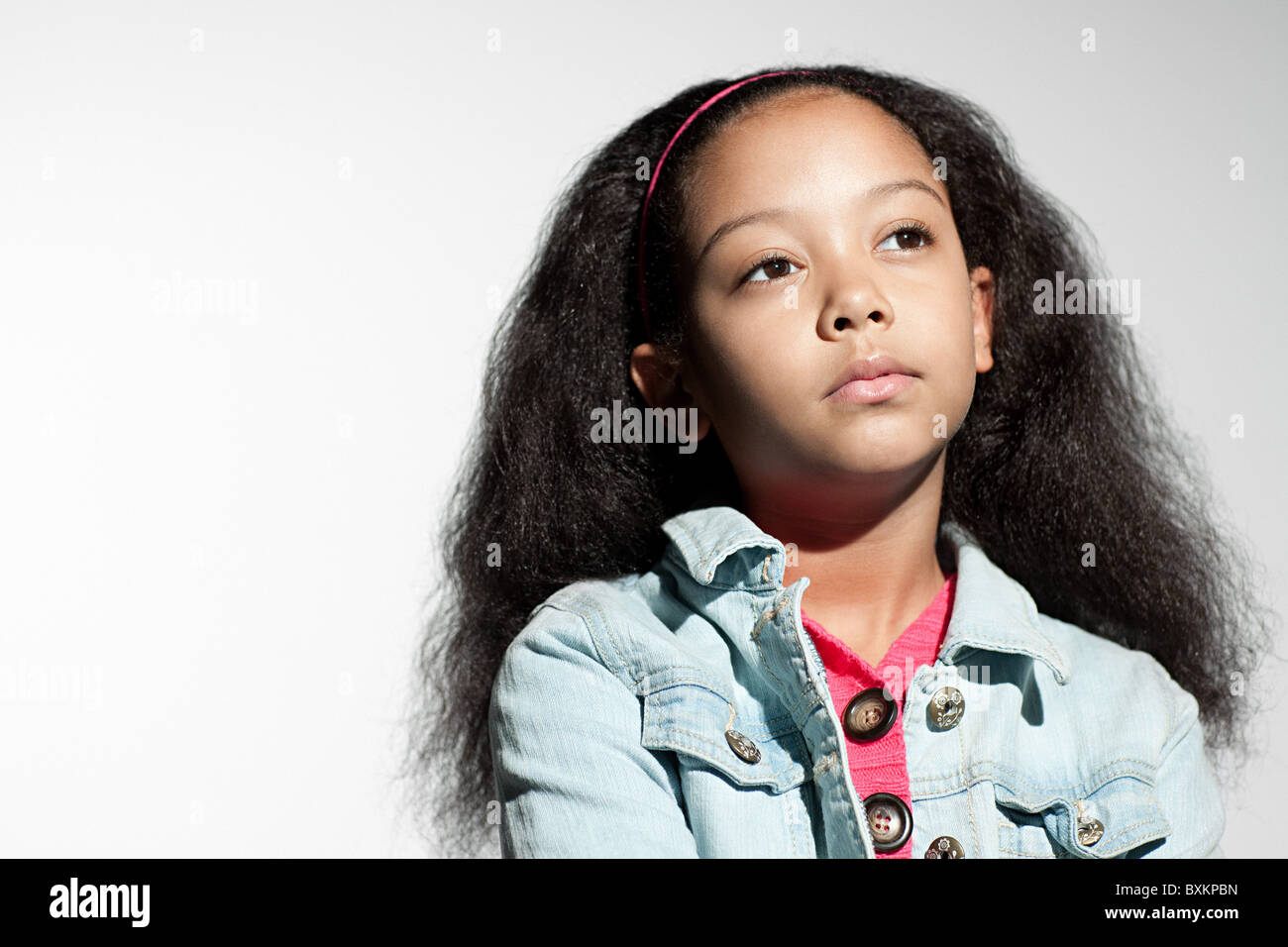 Girl looking serious Stock Photo - Alamy