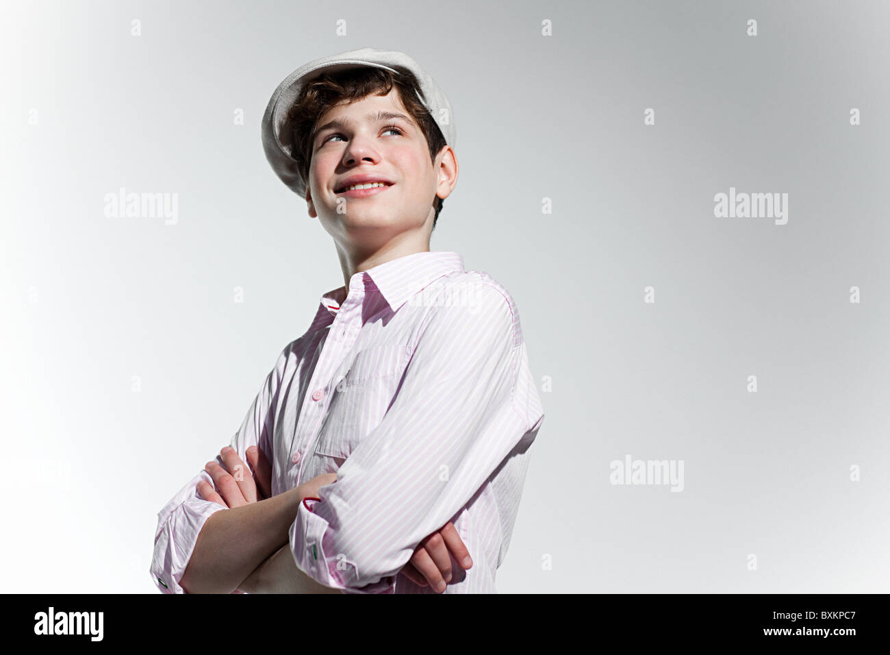 Boy looking up and smiling Stock Photo - Alamy