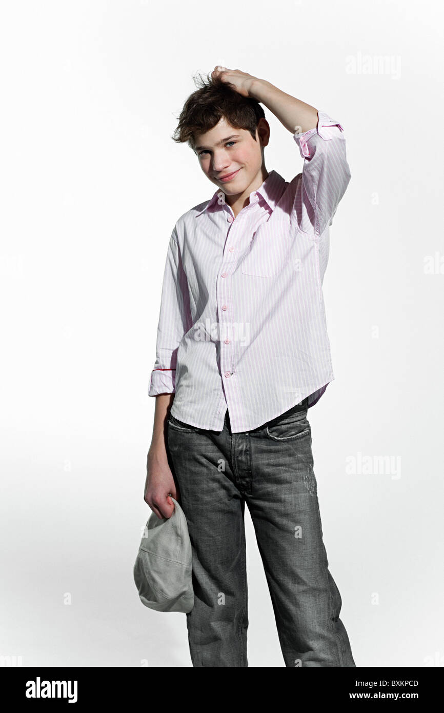 Boy scratching his head Stock Photo - Alamy