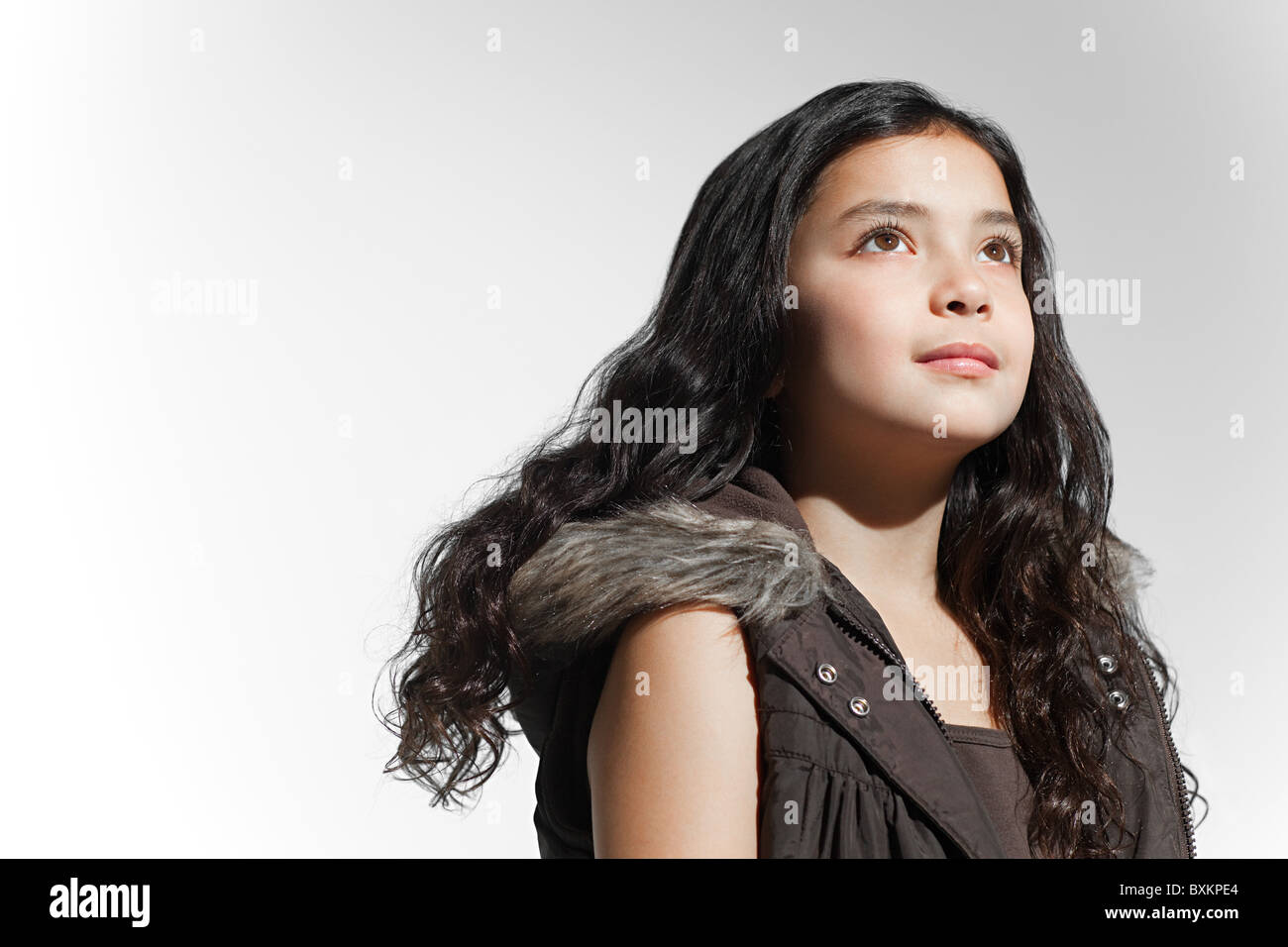 Girl looking up Stock Photo - Alamy