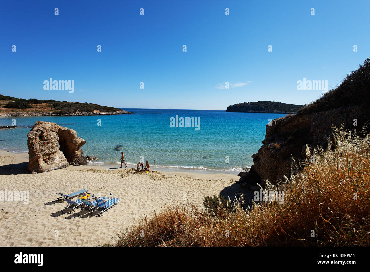 Family at beach, Mirabello Bay, Crete, Greece Stock Photo - Alamy