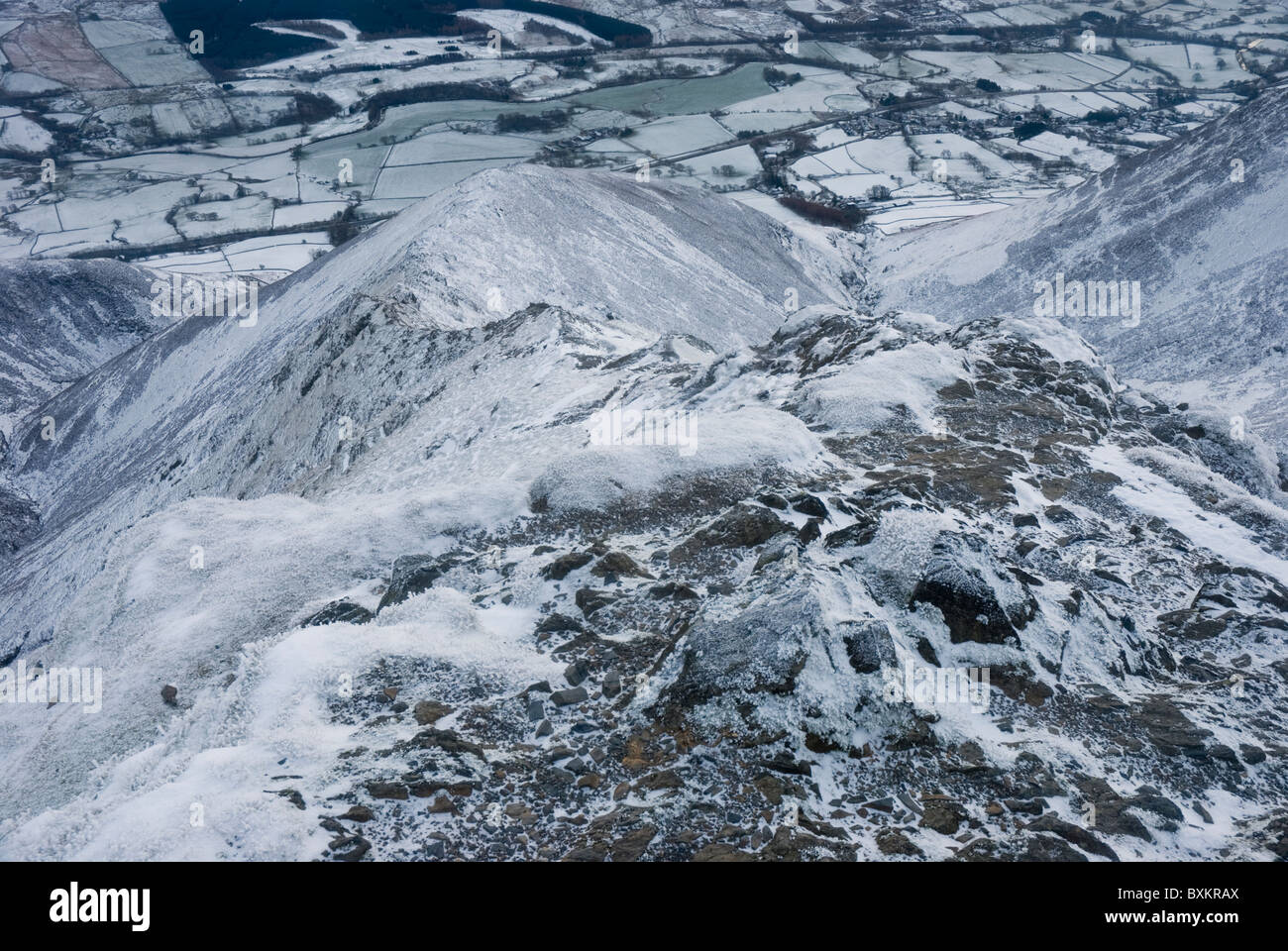 A winter view from Blencathra summit, looking down Halls Fell Ridge ...