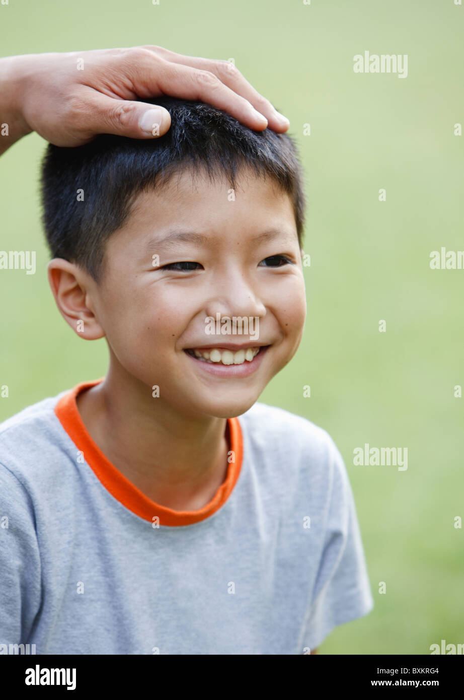 Patted hair hi-res stock photography and images - Alamy