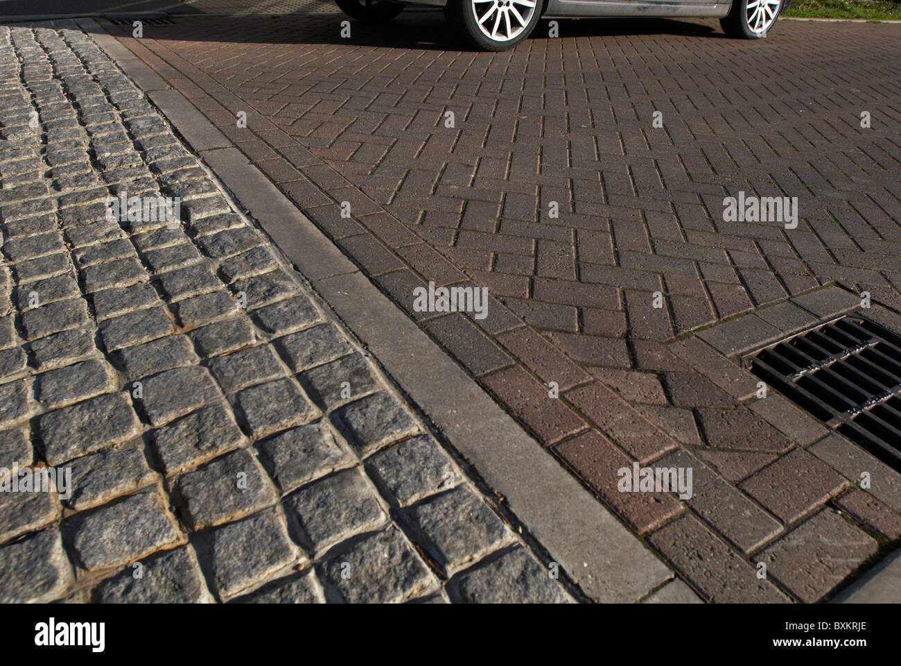 Car and Traffic calming pavement Stock Photo - Alamy