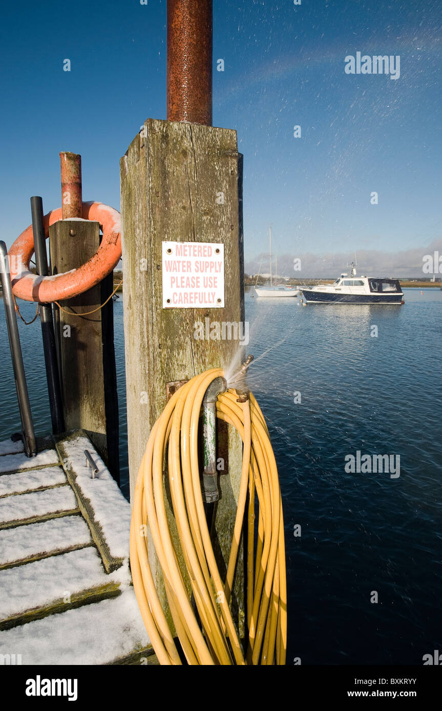 Burst water pipe Stock Photo - Alamy