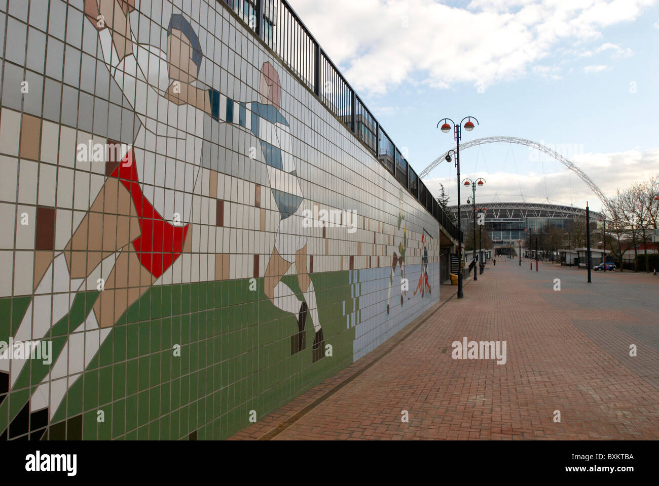 Mural on Wembley Way with Wembley Stadium in background. The Wembley ...