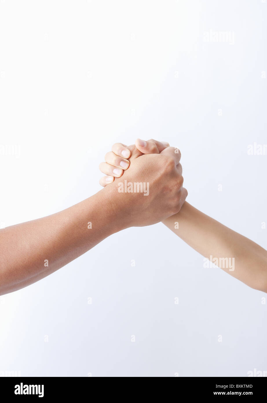 Parent and child holding hands Stock Photo - Alamy