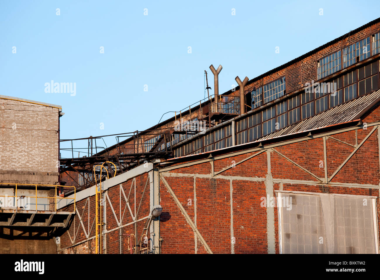 An old obsolete abandoned industrial building architecture Stock Photo ...