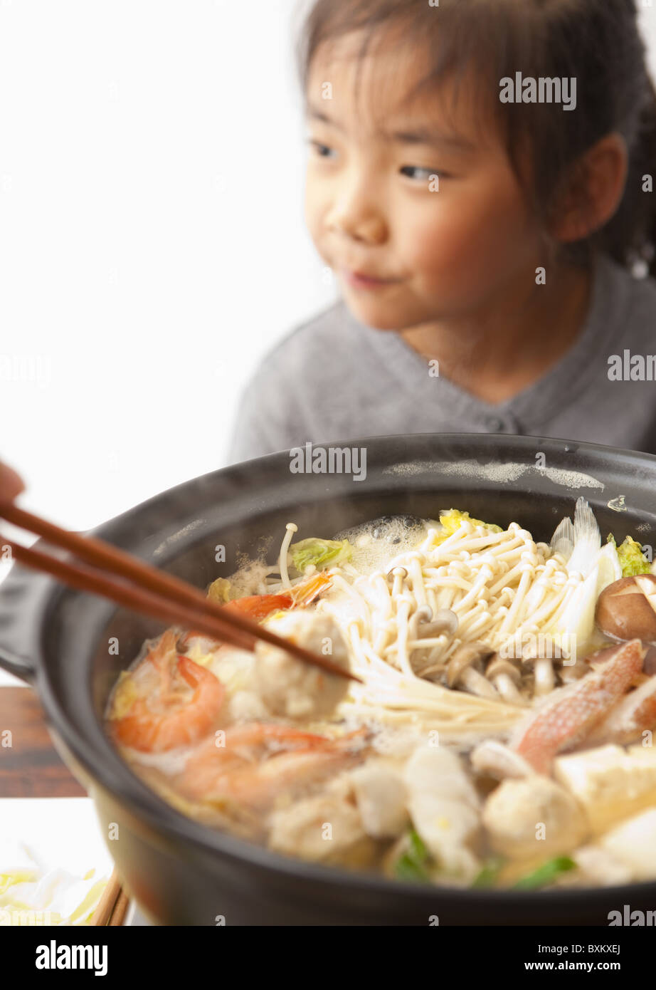Japanese nabe and a girl Stock Photo - Alamy