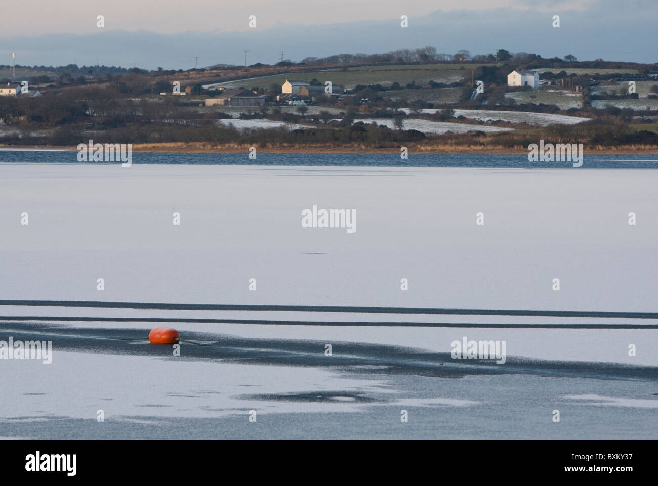 Stithians lake partially frozen Stock Photo - Alamy