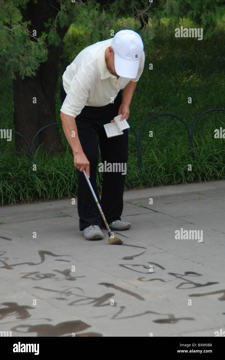 Calligraphy on Pavement, Temple of Heaven Park, Beijing, China Stock ...