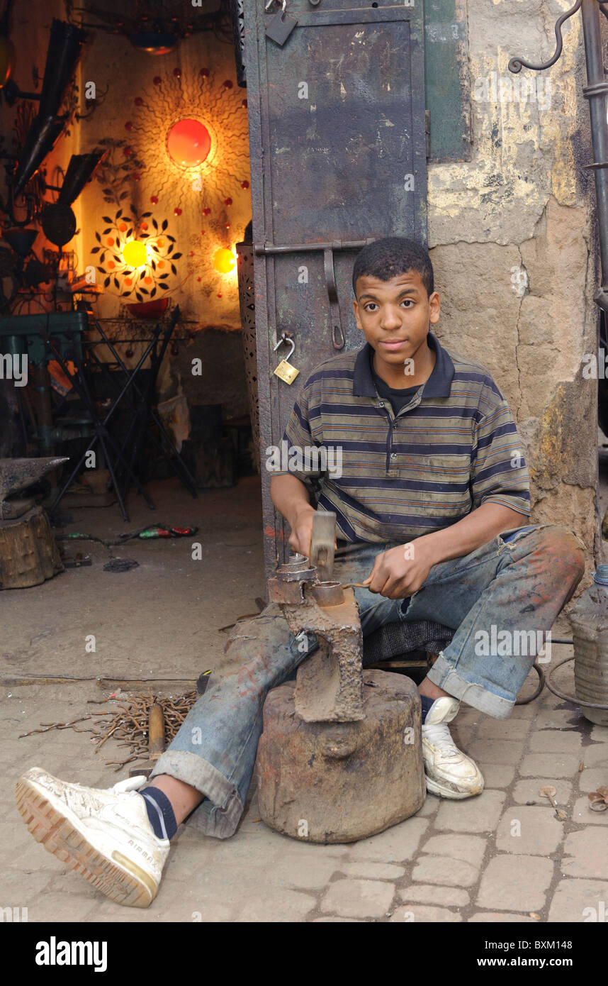 Young Boy at Work Stock Photo - Alamy