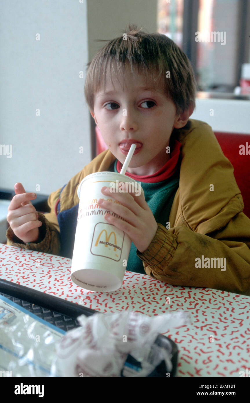 UK. BOY AT A MC DONALDS RESTAURANT IN LONDON Stock Photo - Alamy