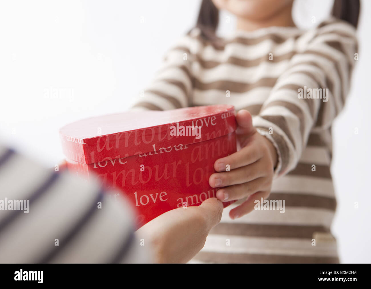 A girl sending a present Stock Photo - Alamy