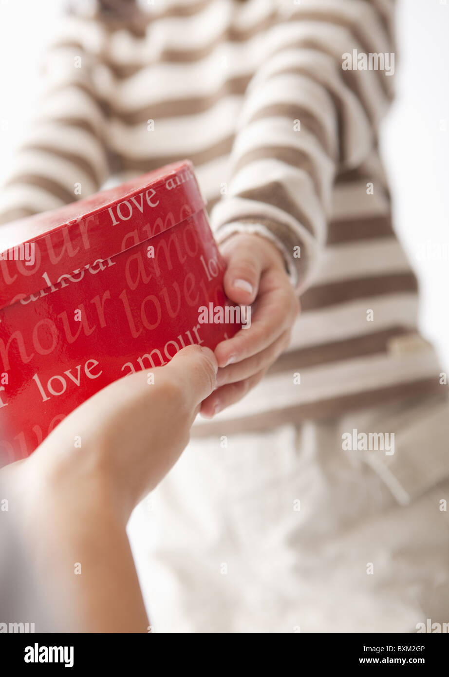 A girl sending a present Stock Photo - Alamy