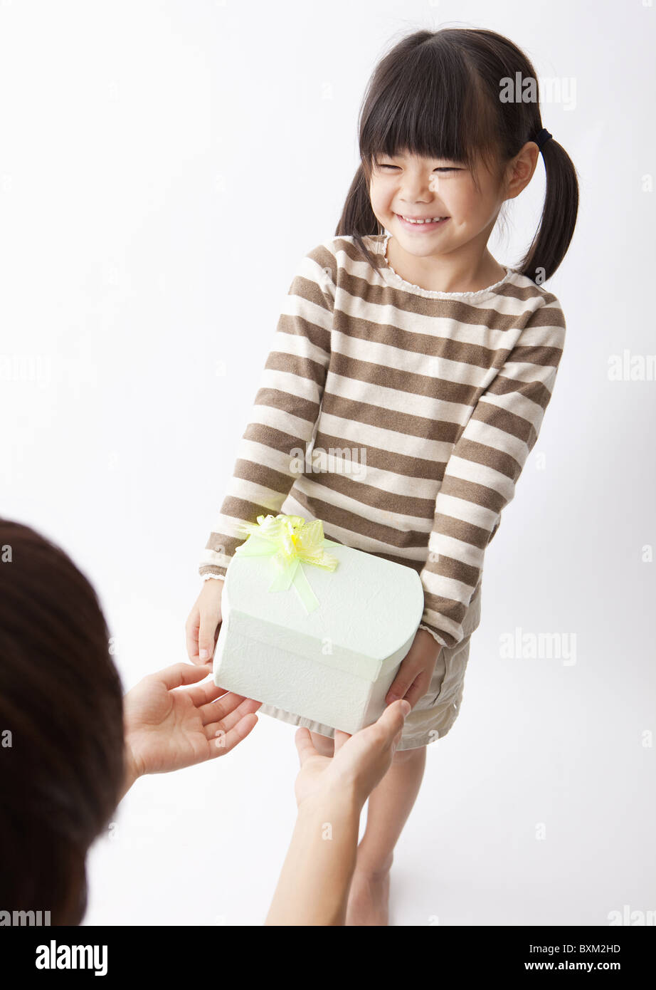 A girl sending a present Stock Photo - Alamy