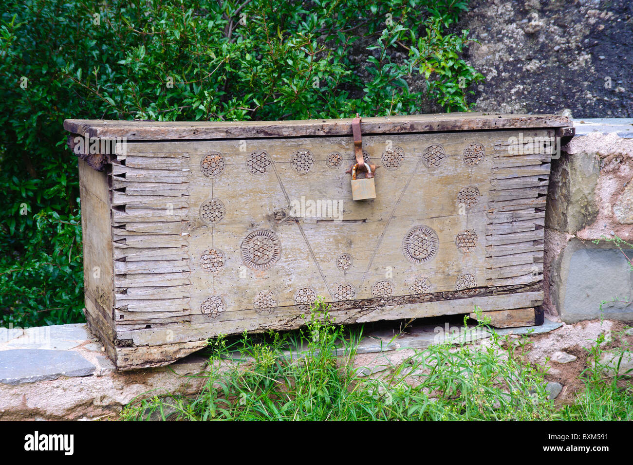 Old wooden chest with sculpted motifs, picture taken outside a ...