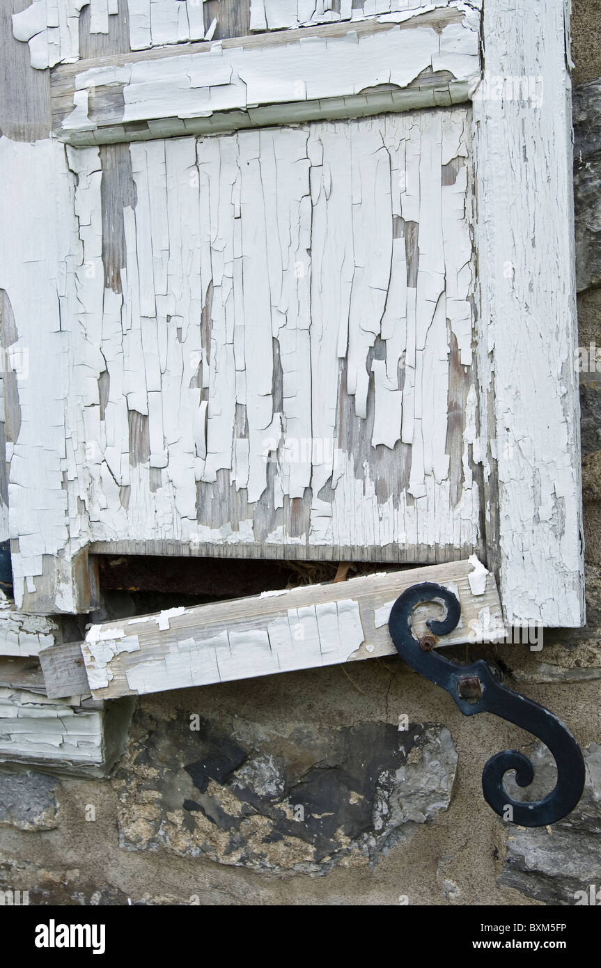 Old window shutter peeling paint hi-res stock photography and images ...