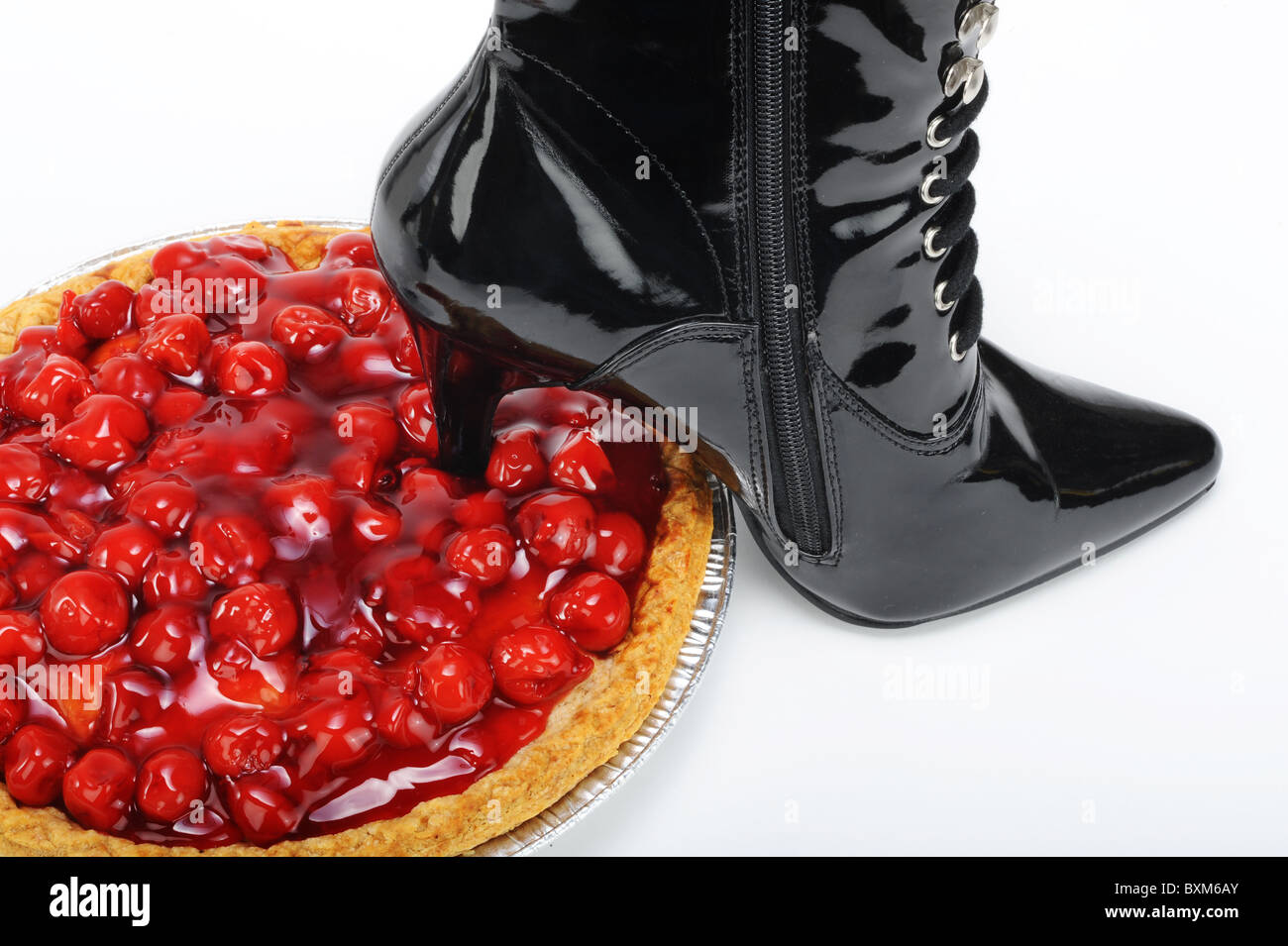 Red cherry pie with high heel in it Stock Photo - Alamy