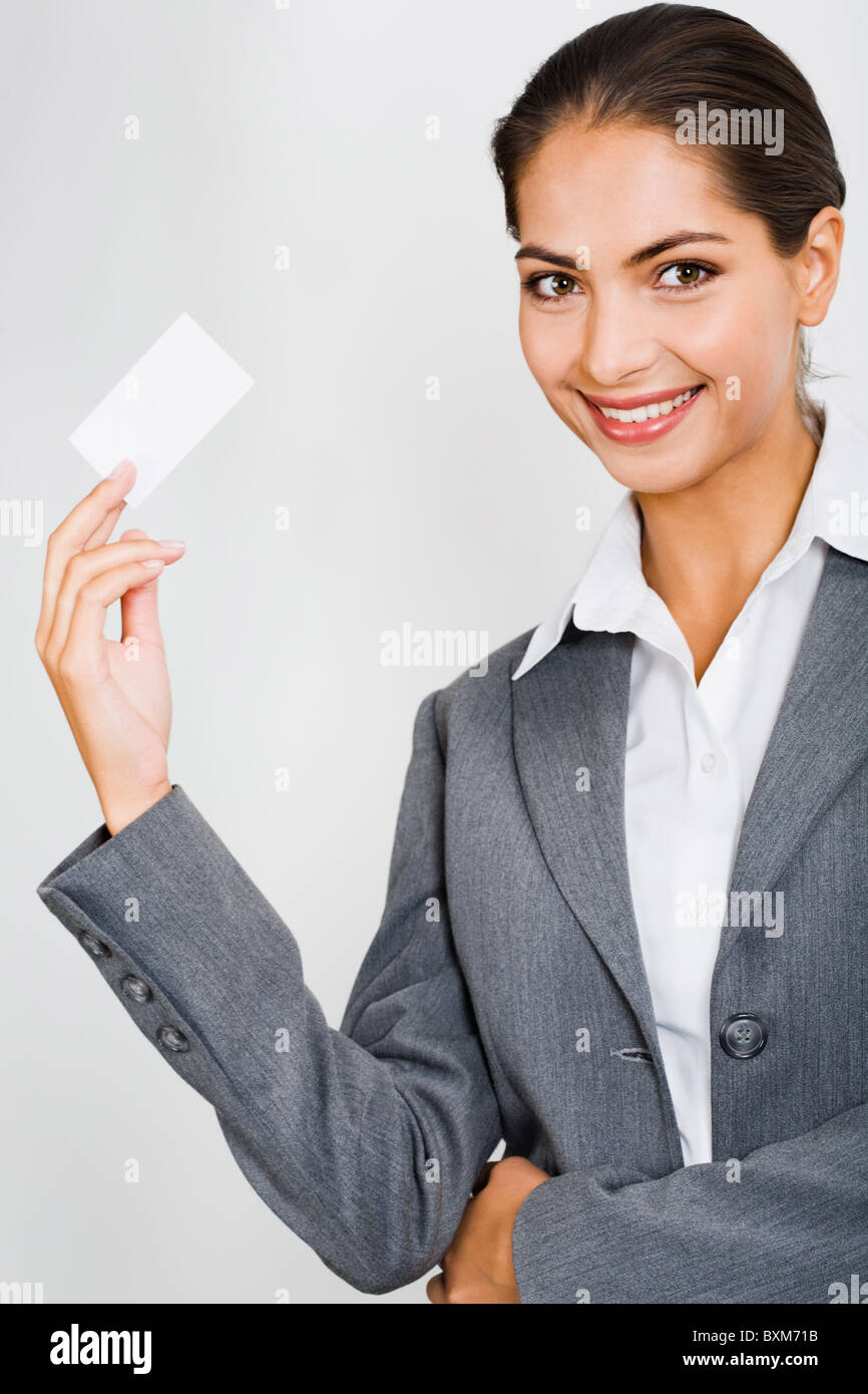 Young beautiful woman presenting her business card Stock Photo - Alamy