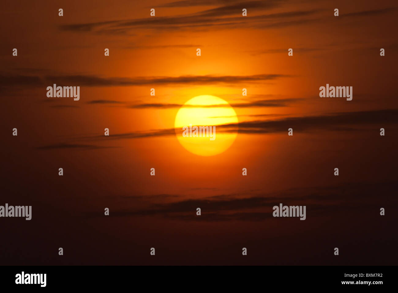 Golden Sun and Clouds Stock Photo - Alamy