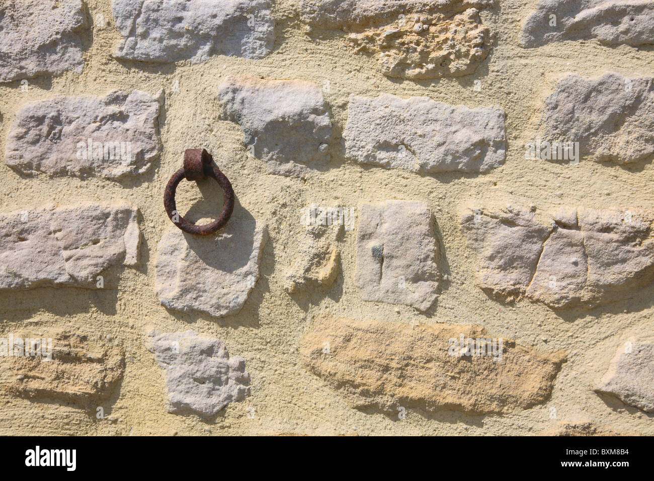 Rusty tethering ring in stone wall in Normandy, France Stock Photo - Alamy