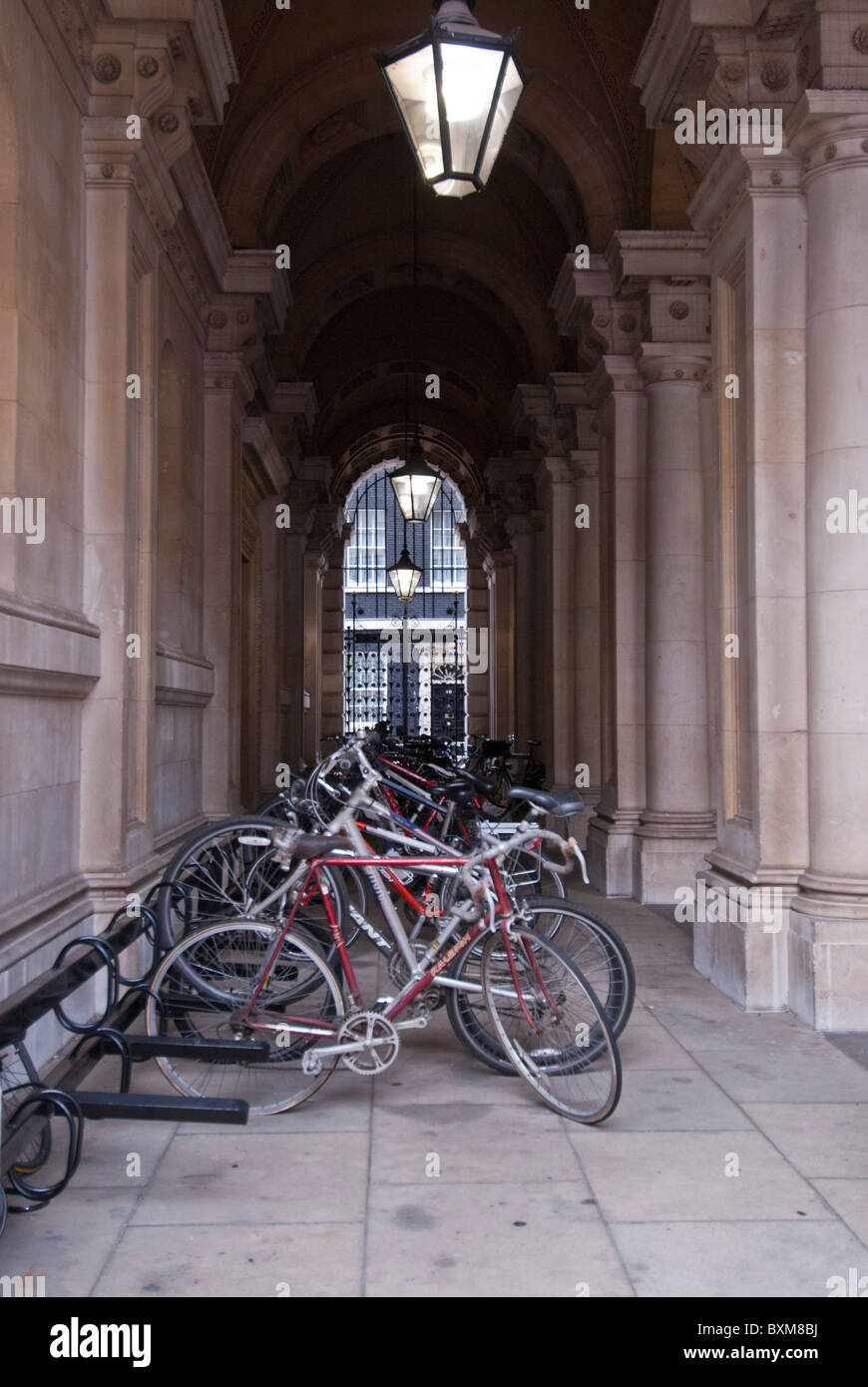 Bike rack Bicycles parked under arch view of No. ten Downing Street ...