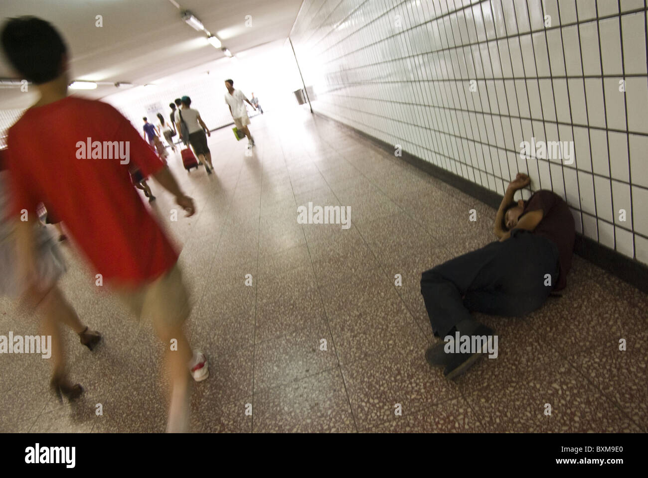 homeless man sleeping in underpass,beijing,china Stock Photo - Alamy