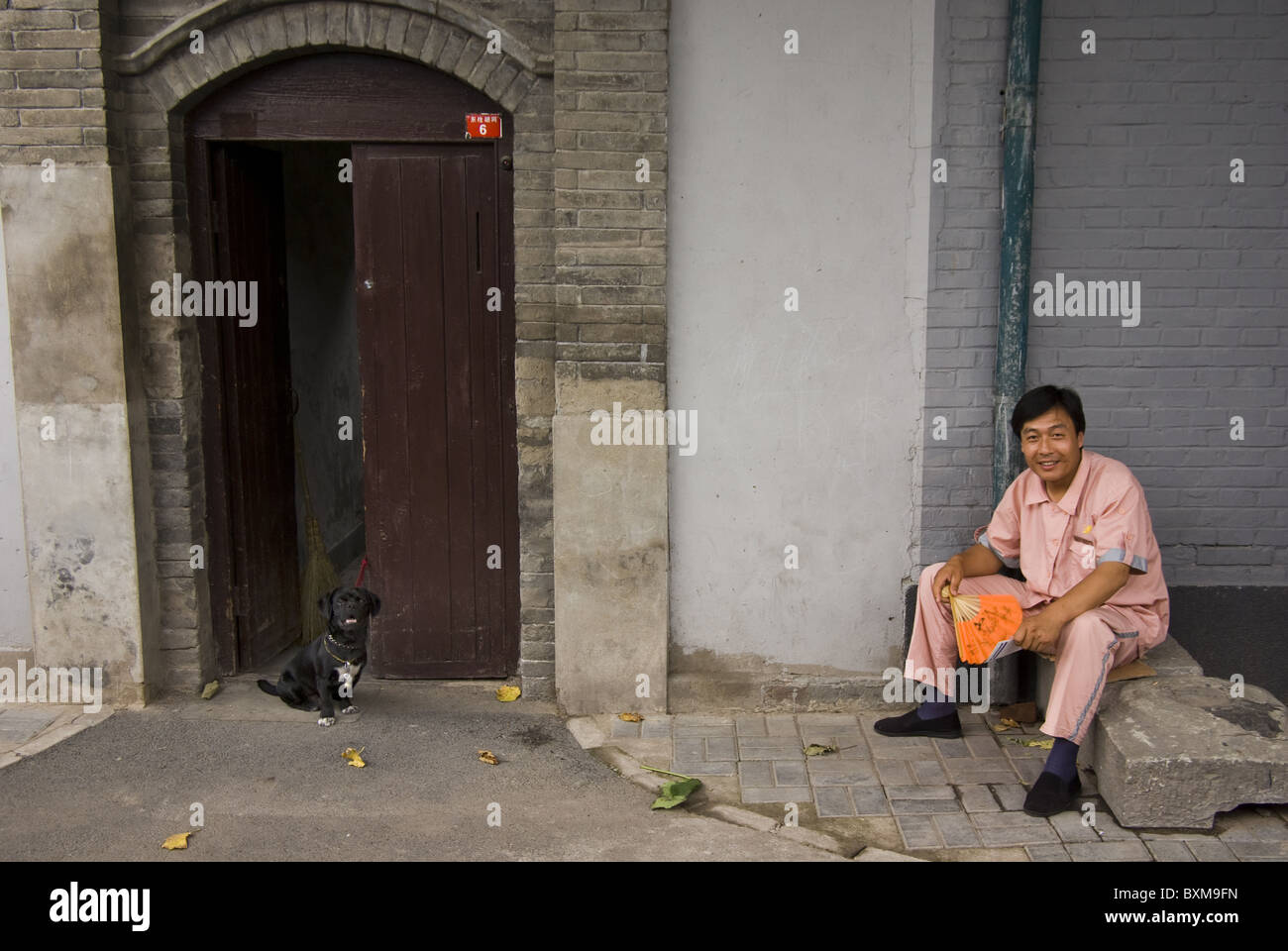 Chinese man and his dog in china town hi-res stock photography and ...