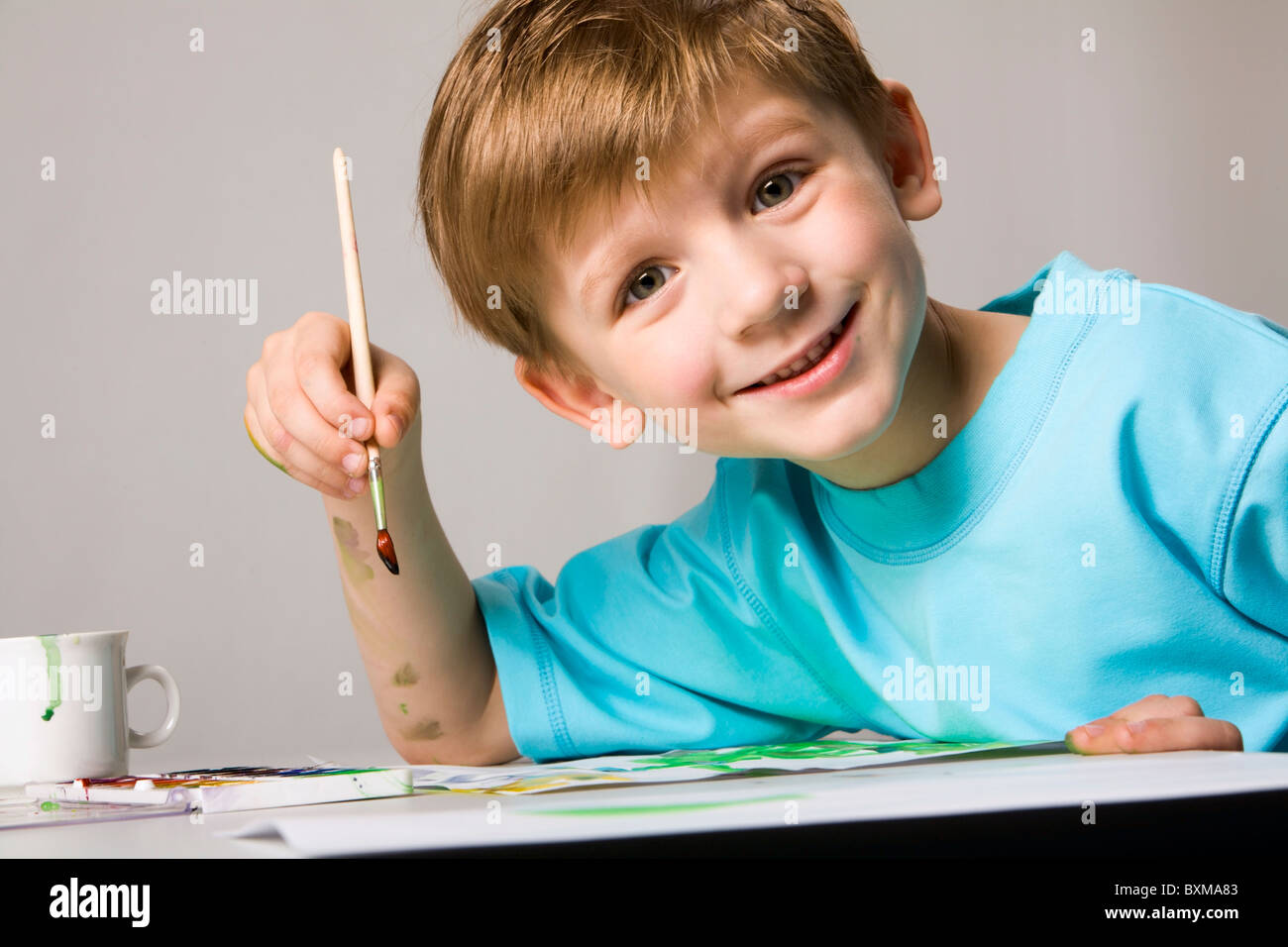 Small boy painting hi-res stock photography and images - Alamy