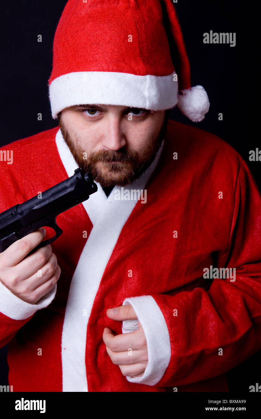 Santa with gun hi-res stock photography and images - Alamy