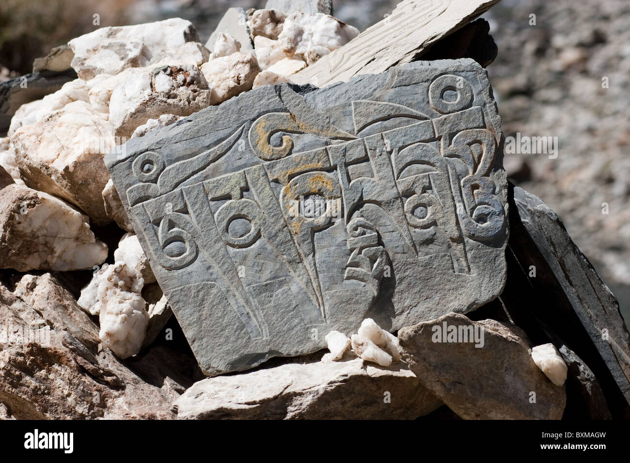 Small mani wall carved with mantra of Avalokiteshvara (Om Mani Padme ...