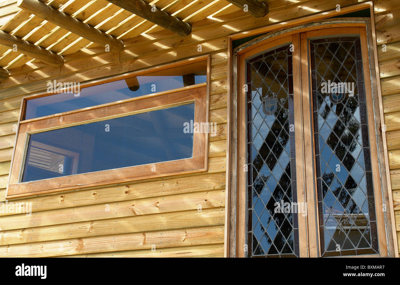 Windows at rustic cabin, constructed at rural sector Stock Photo - Alamy