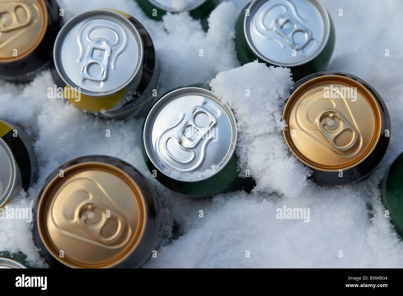 beer and alcohol cans buried in snow to keep them cool outdoors during ...