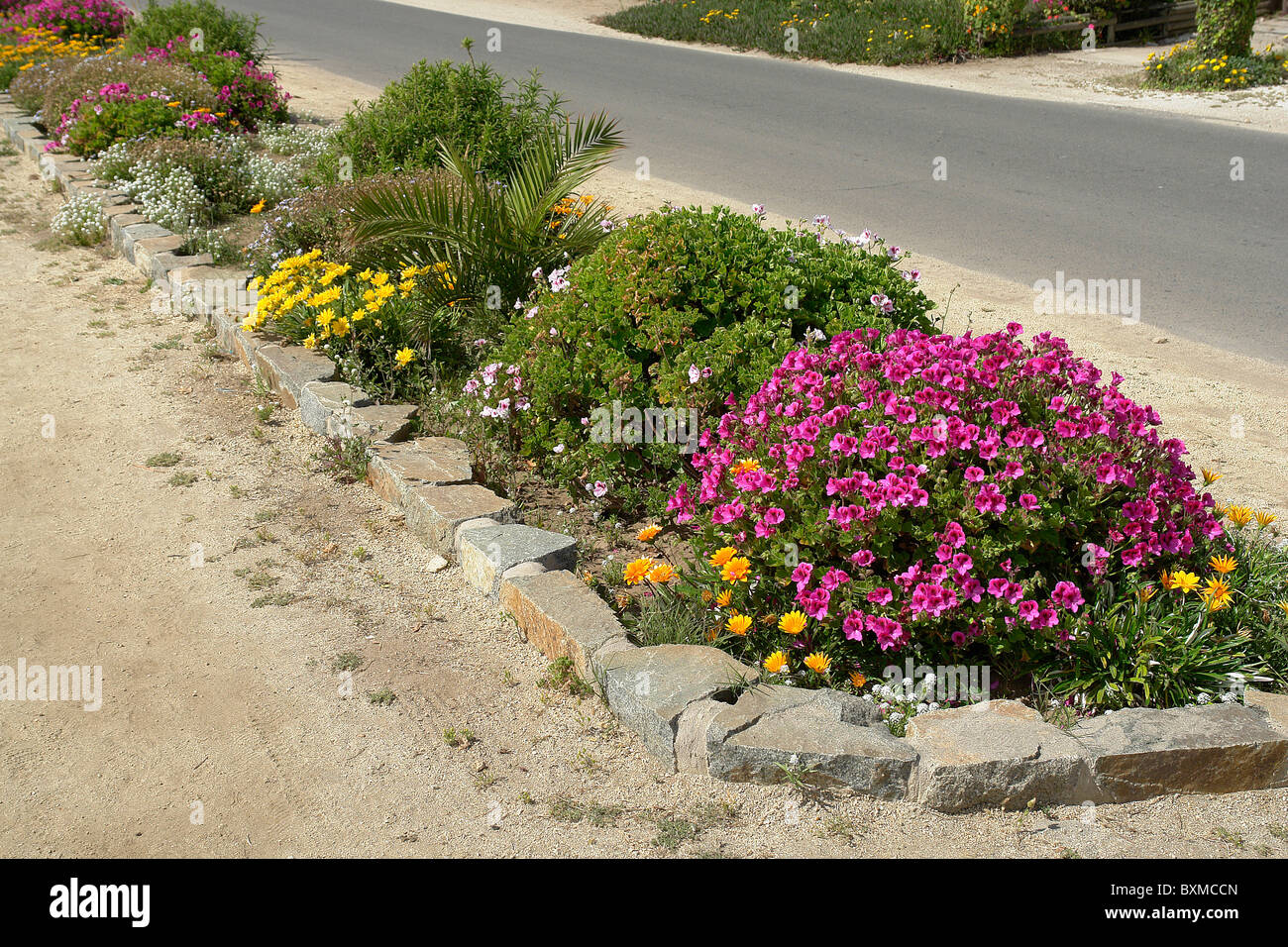 Garden by the side of the road at rural sector Stock Photo - Alamy