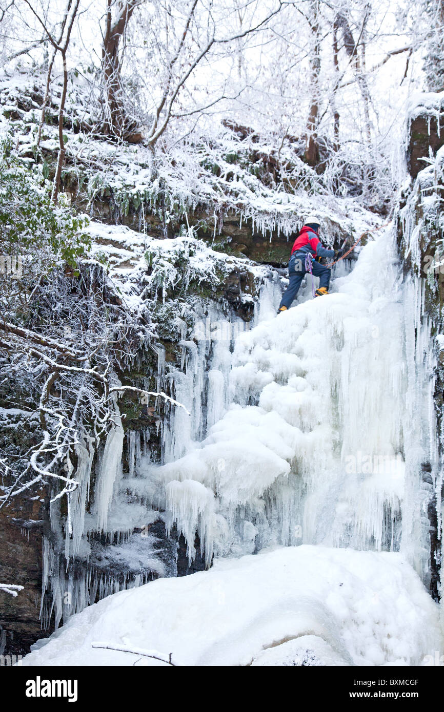 Ice climber at a frozen waterfall hi-res stock photography and images ...