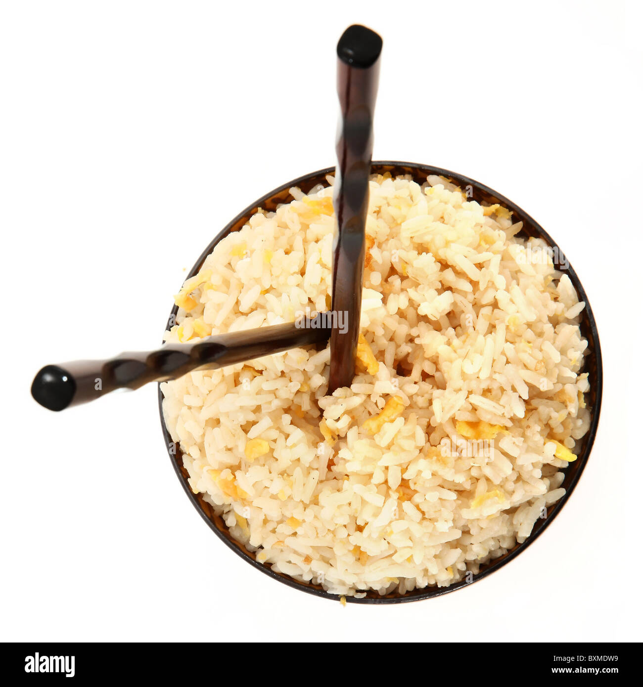 Vertical chopsicks stuck in bowl of rice symbolizing Chinese Feeding ...