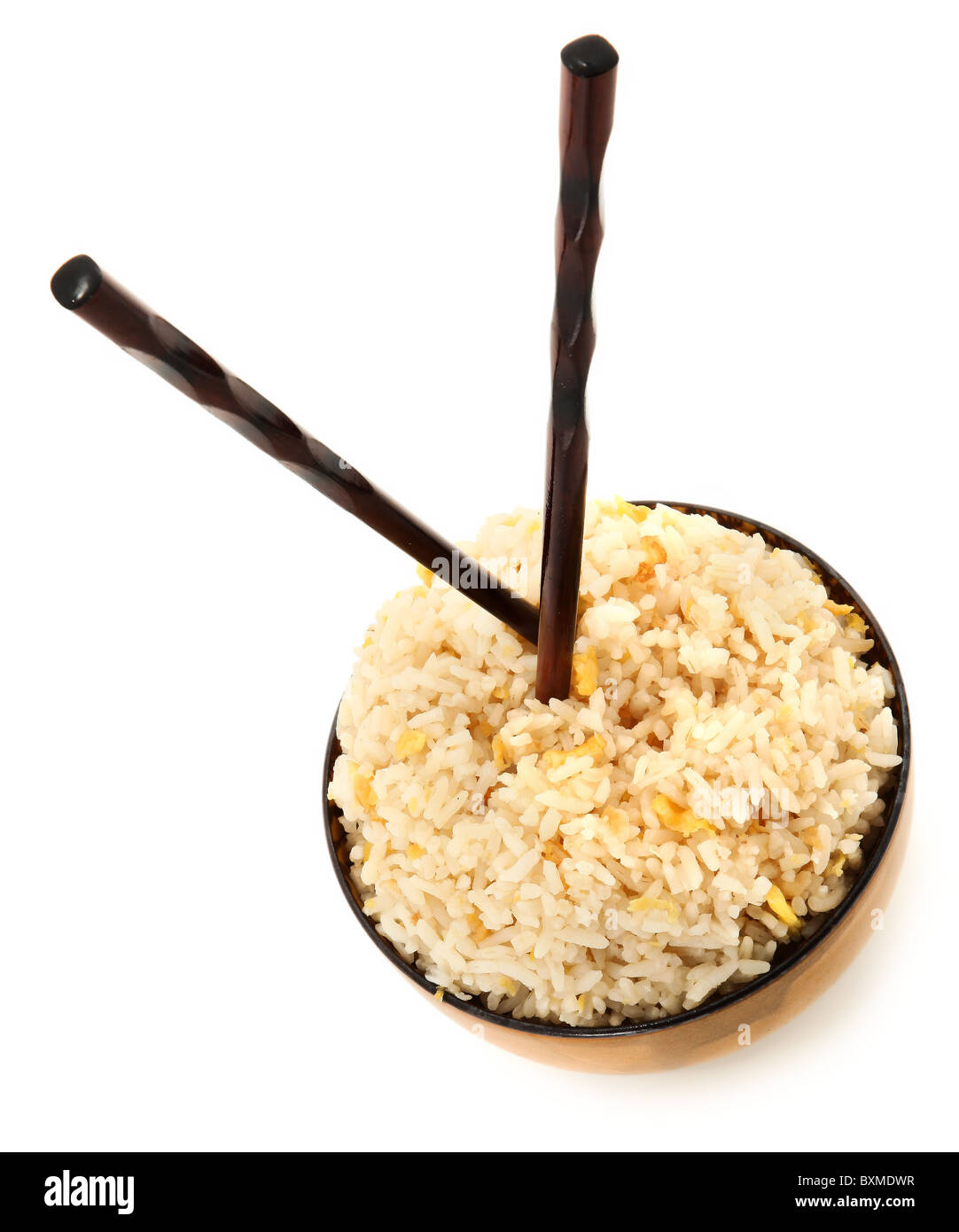 Bowl of fried rice with chopsticks stuck vertical symbolizing the ...