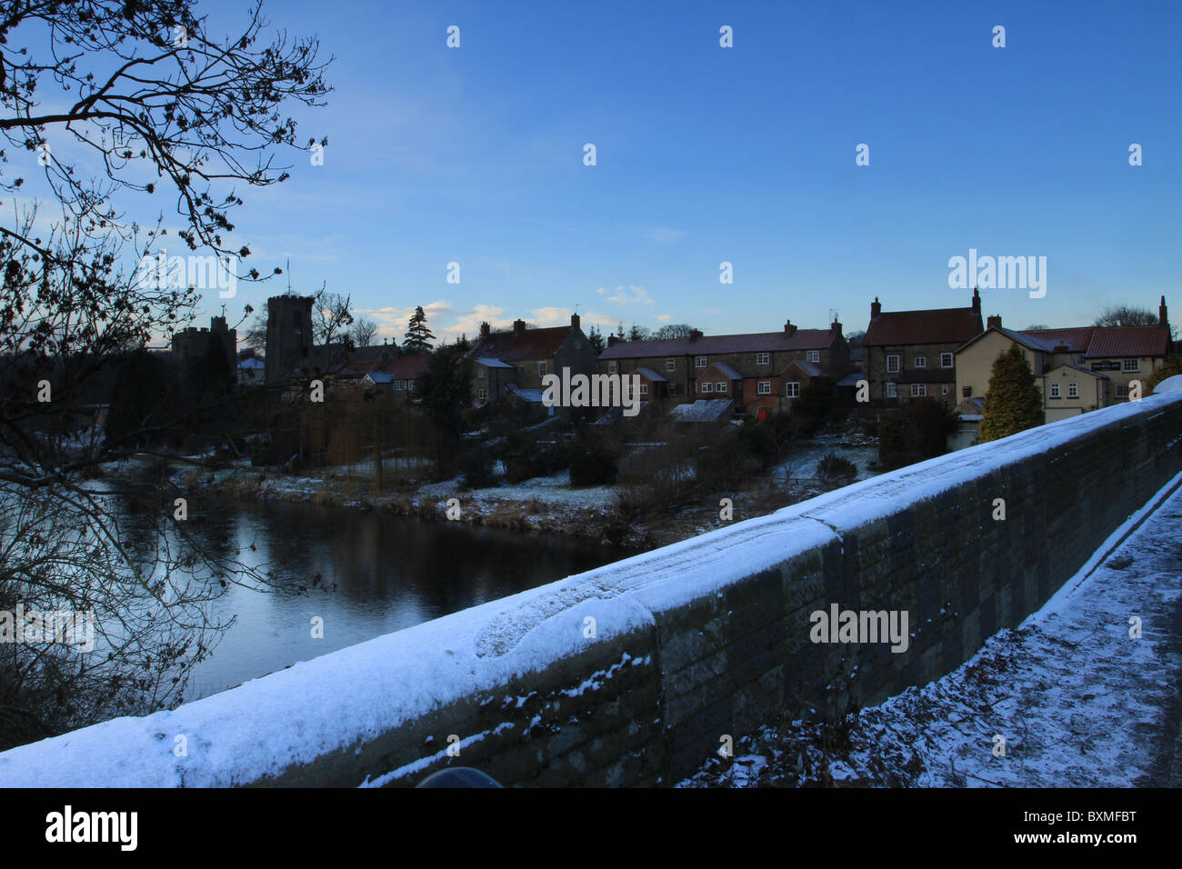 Winters view of West Tanfield from the other side of the bridge over ...