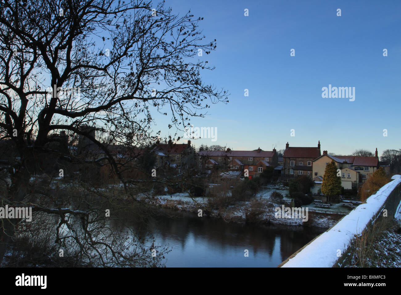 Winters view of West Tanfield from the other side of the bridge over ...