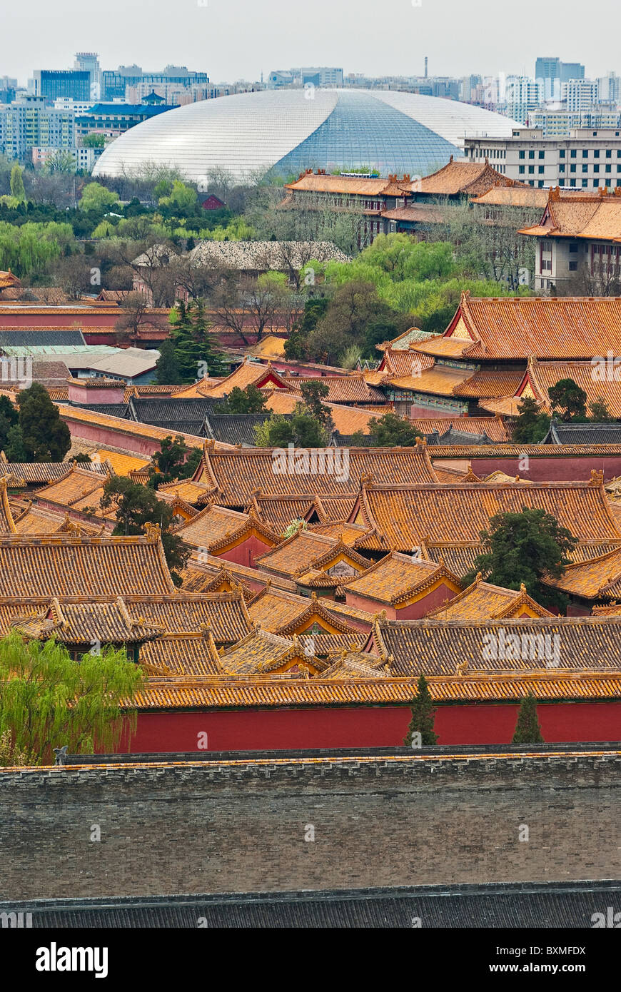 Asia, China, Beijing. Beijing Opera House rises over West side of ...
