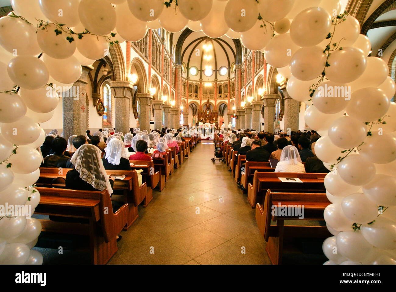 Mass at Jeondong Cathedral, Jeonju Hanok Village, South Korea Stock ...