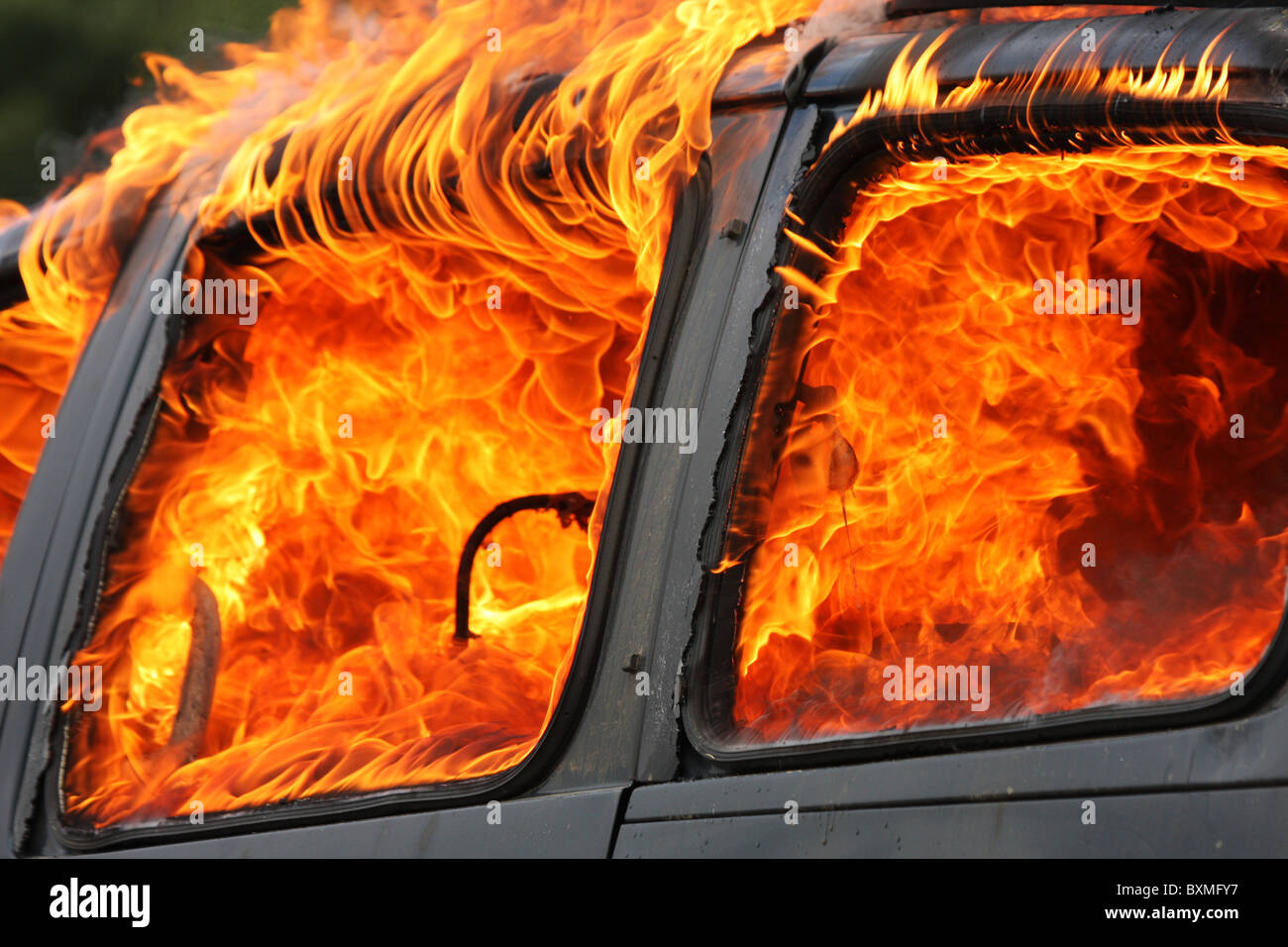 A car on fire Stock Photo - Alamy