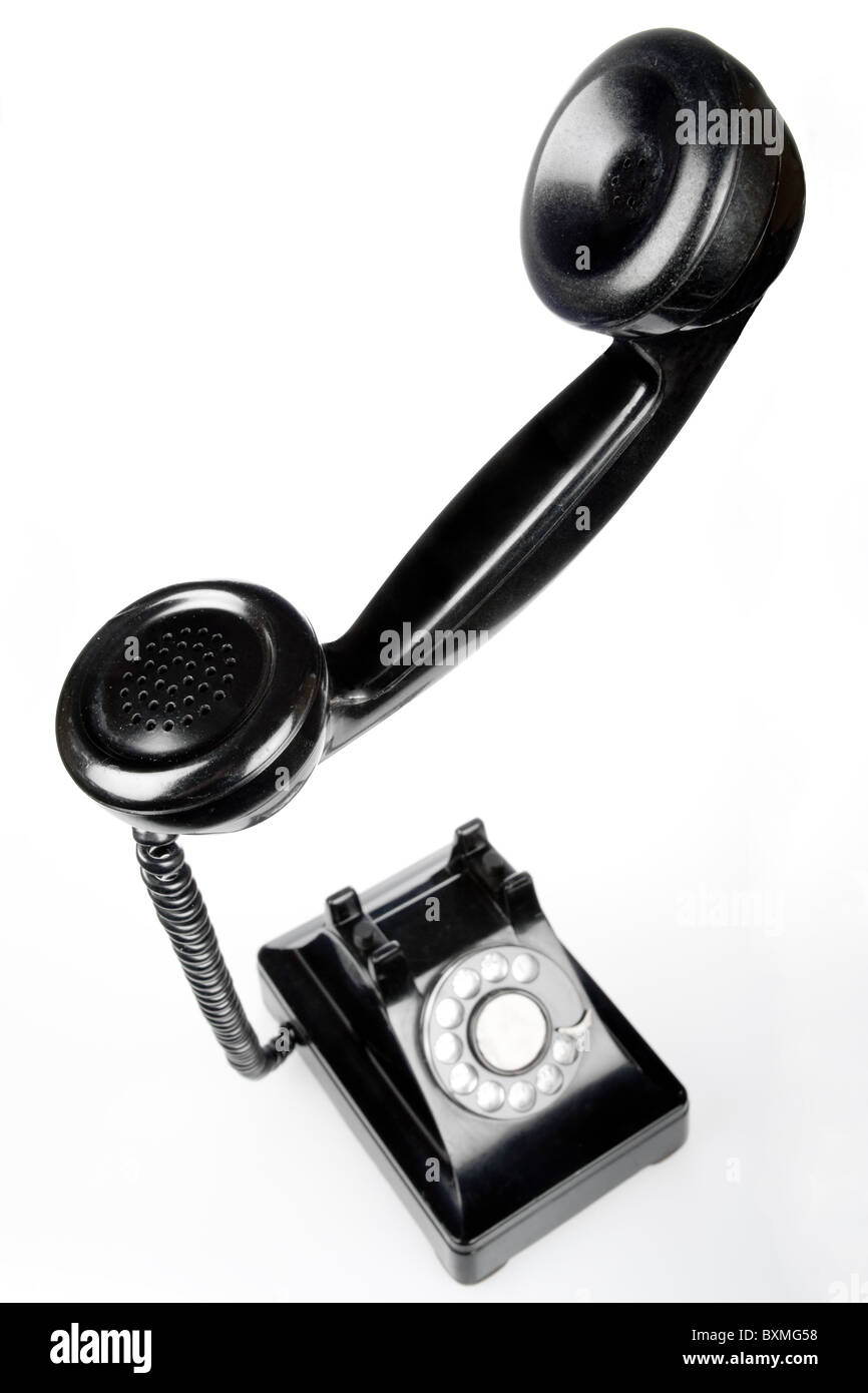 Unique perspective of retro phone on white background Stock Photo - Alamy