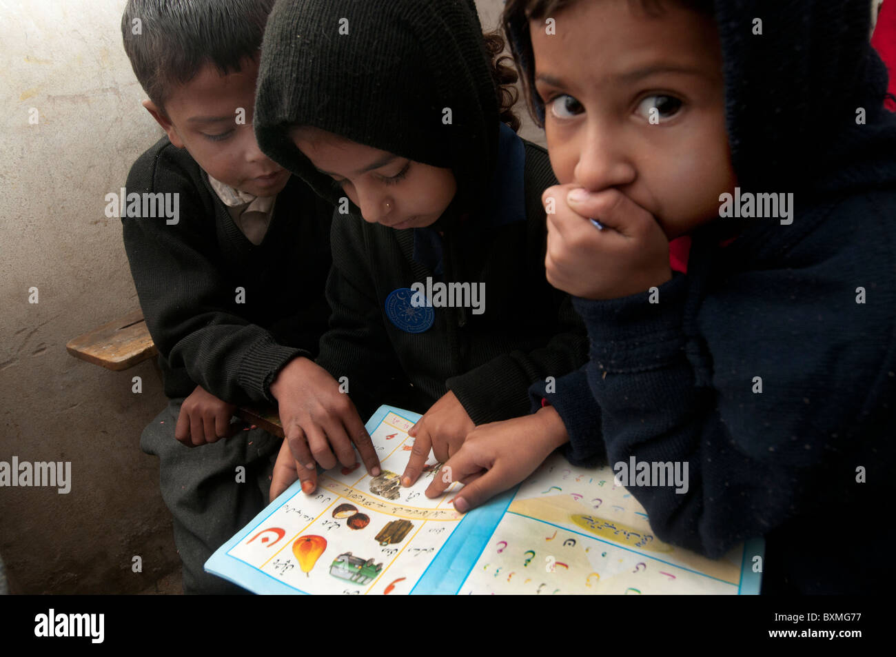 Pakistan reading book hi-res stock photography and images - Alamy
